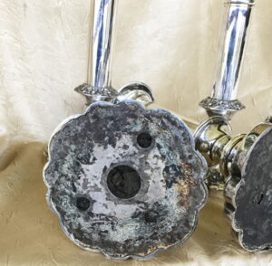 How do I identify the value of antique silver candlesticks?